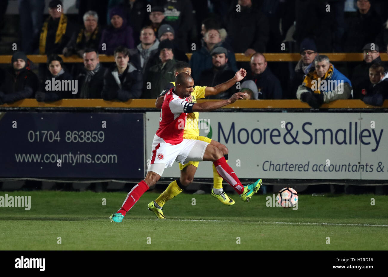 Southport's Jamie Allen and Fleetwood Town's Nathan Pond (left) battle ...