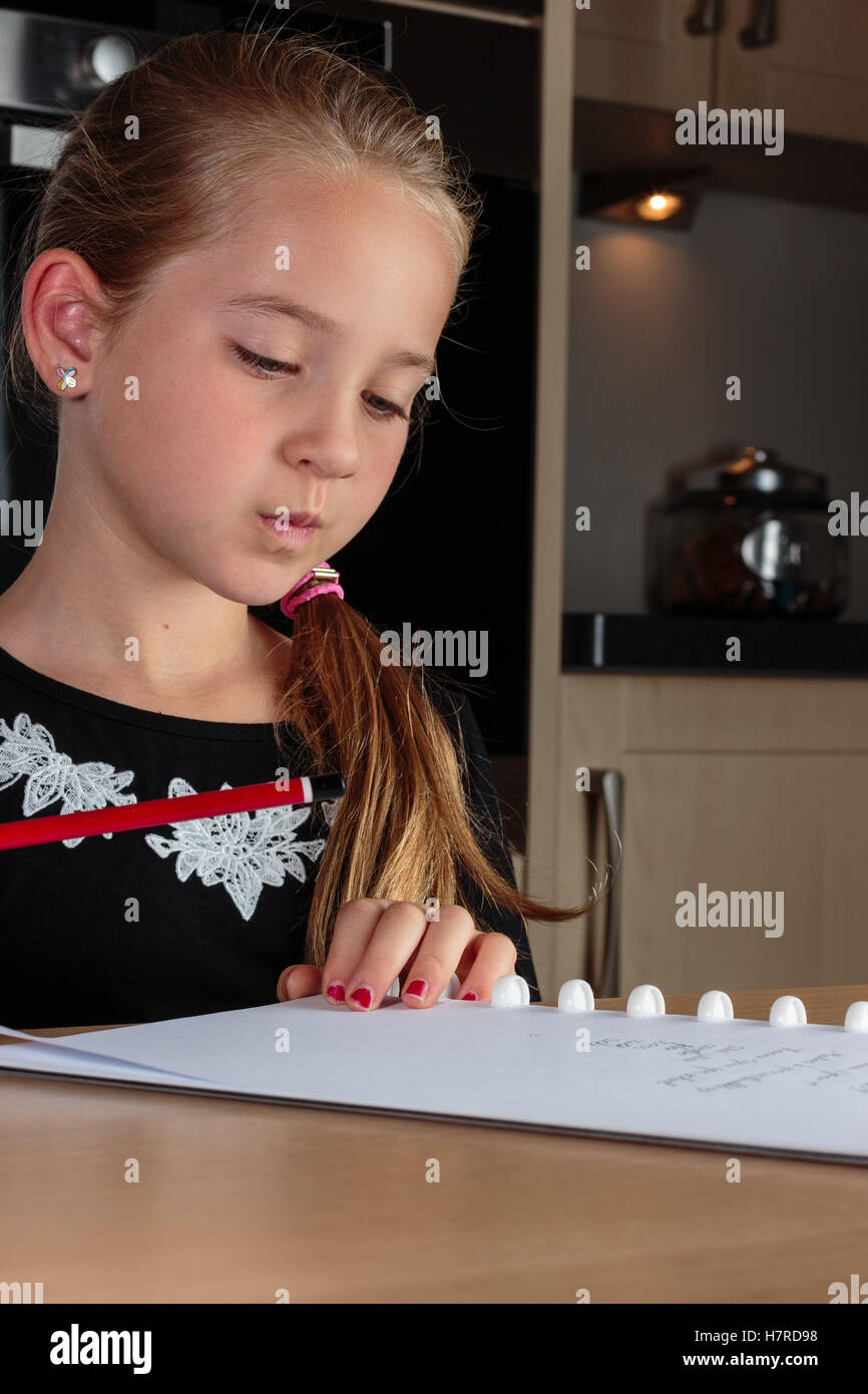 Woman thinking with pen pencil hi-res stock photography and images - Alamy