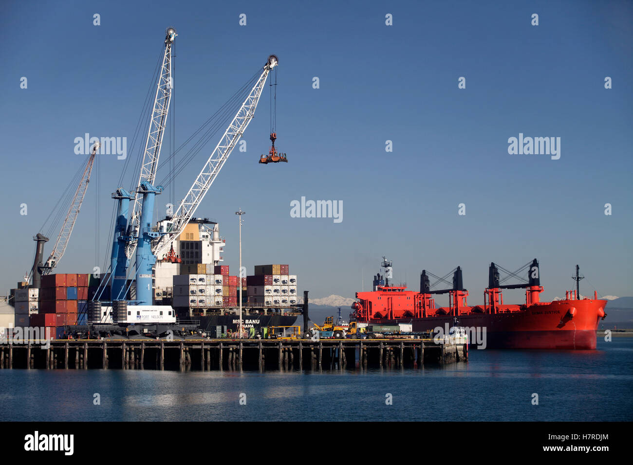A vessel nears the quay at Port Nelson where the huge cranes await ...