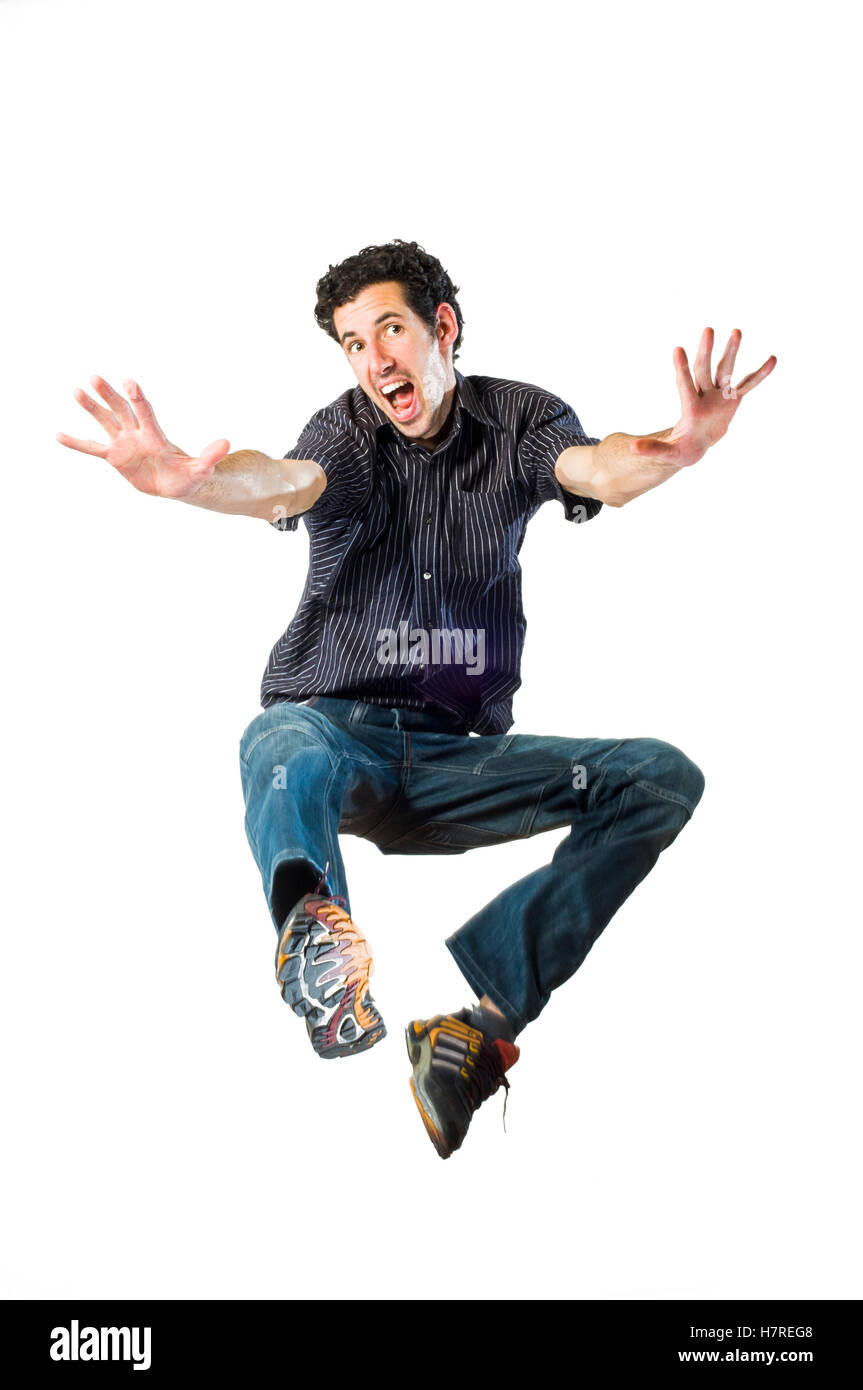 Young man jumping Stock Photo - Alamy