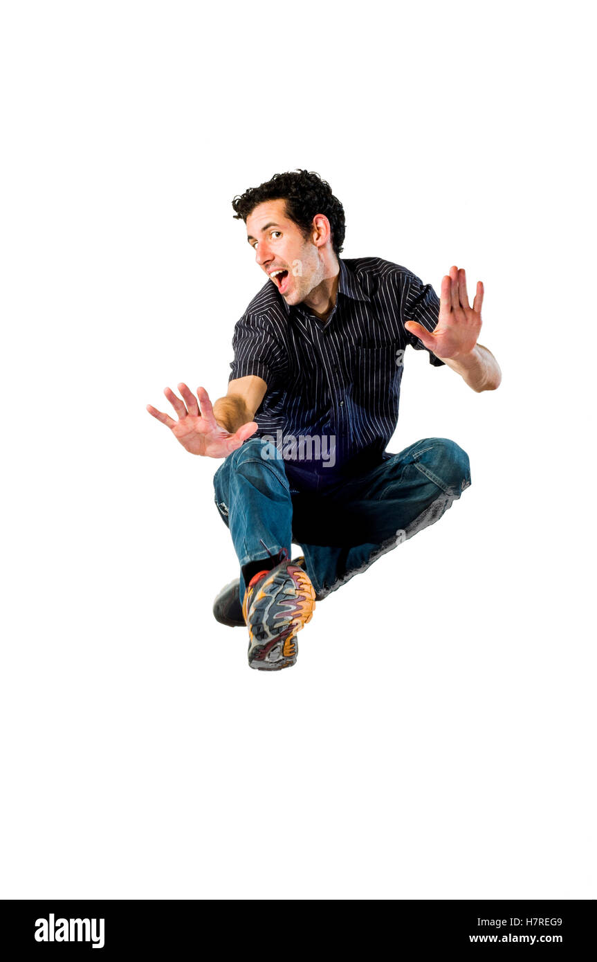 Young man jumping Stock Photo - Alamy