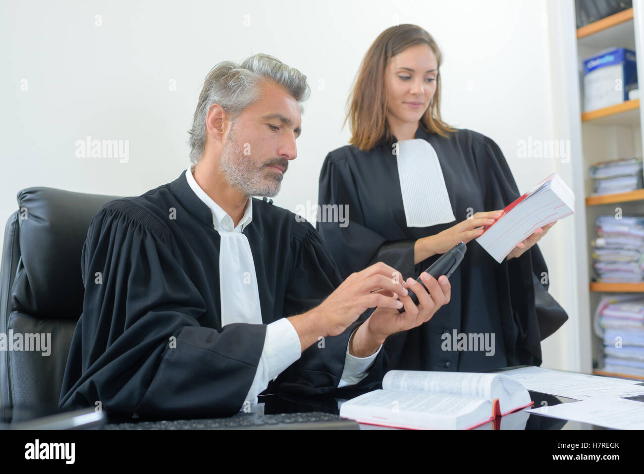 Judges in office Stock Photo - Alamy