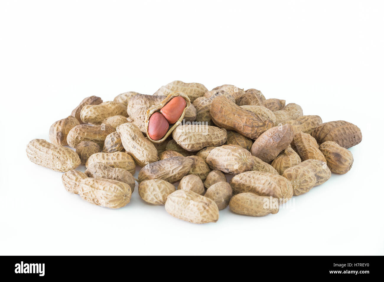 Dry roasted peanuts isolated on white background Stock Photo - Alamy