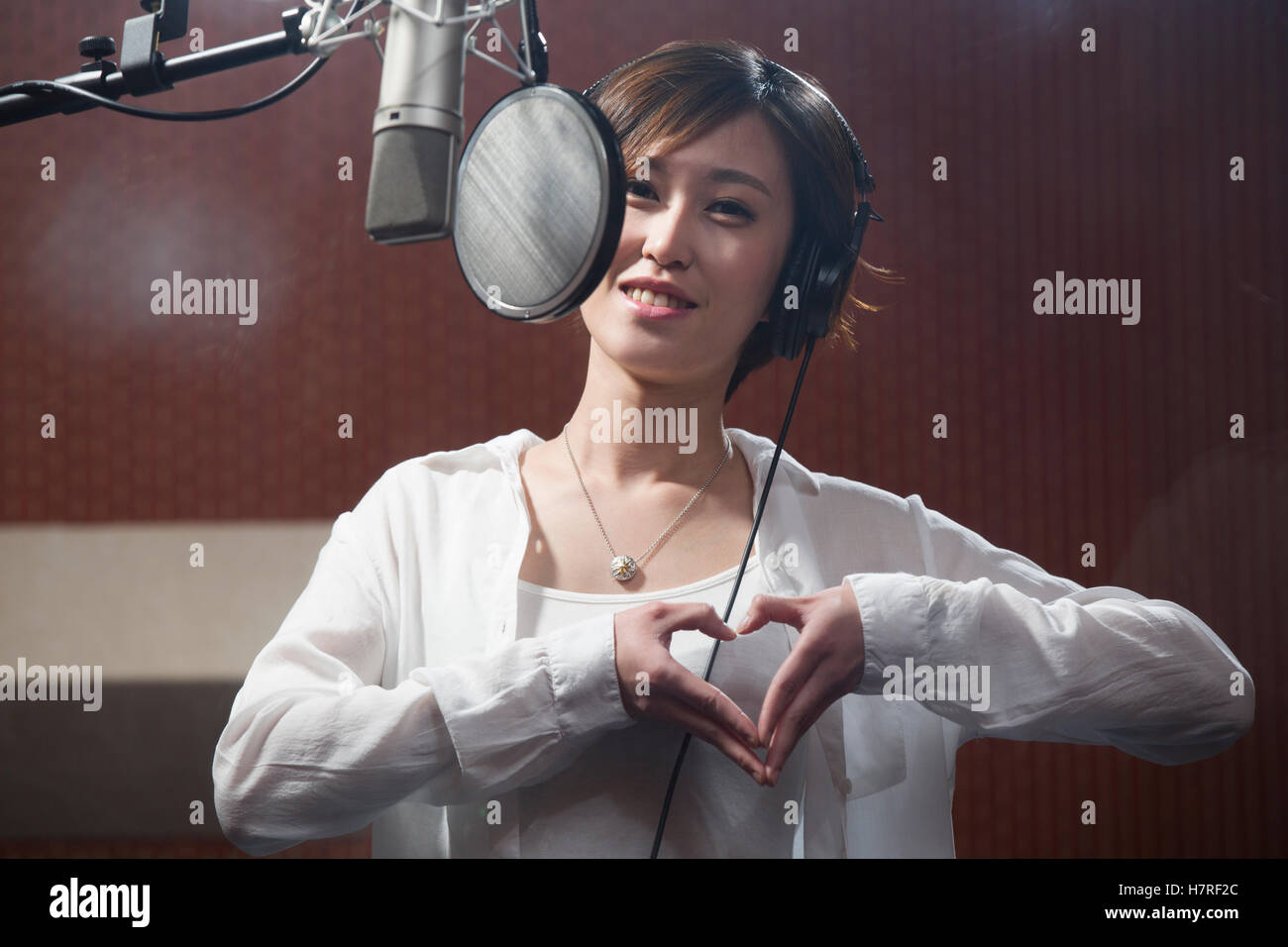 Woman singing in recording studio hi-res stock photography and images ...