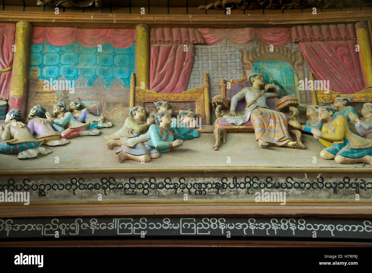 Yangon, Burma - 11 November 2014. Bas relief of Burmese king with ...