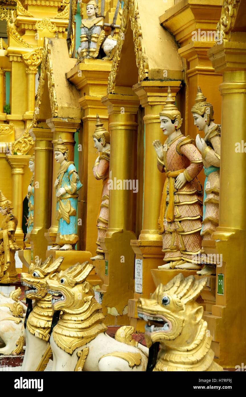 Yangon, Myanmar - 11 November 2014. Statues of Burmese figures and ...
