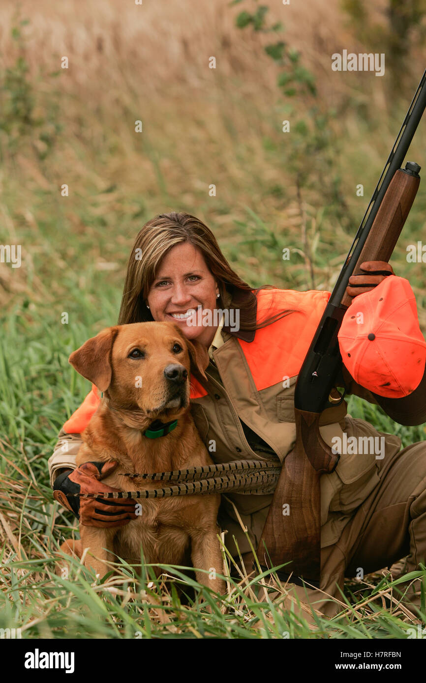 Female Upland Hunter With Rusty Lab Stock Photo - Alamy