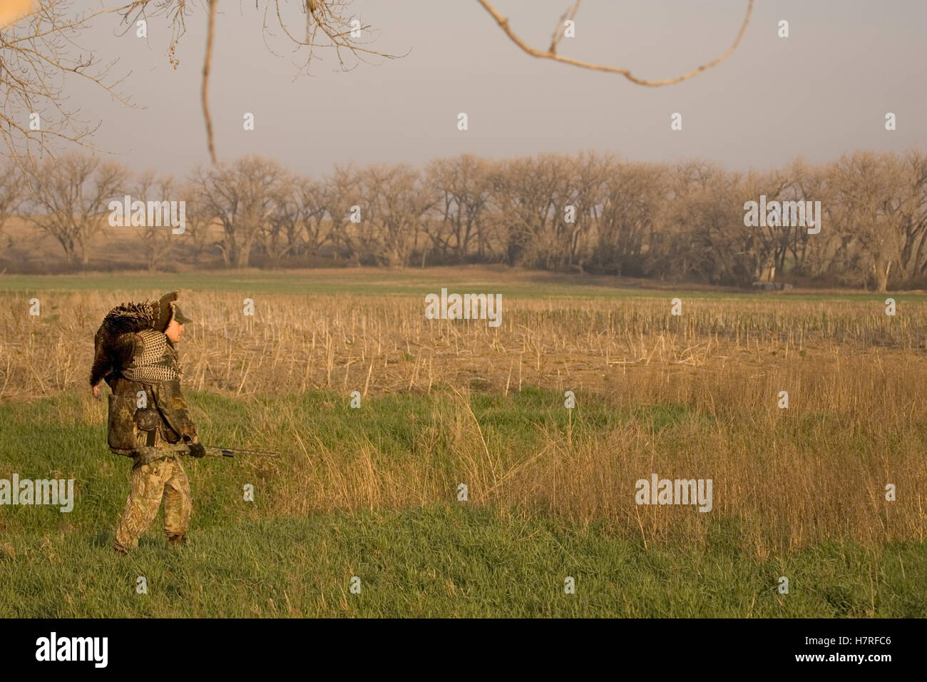 Spring Turkey Hunter With Turkey On Shoulder Stock Photo - Alamy