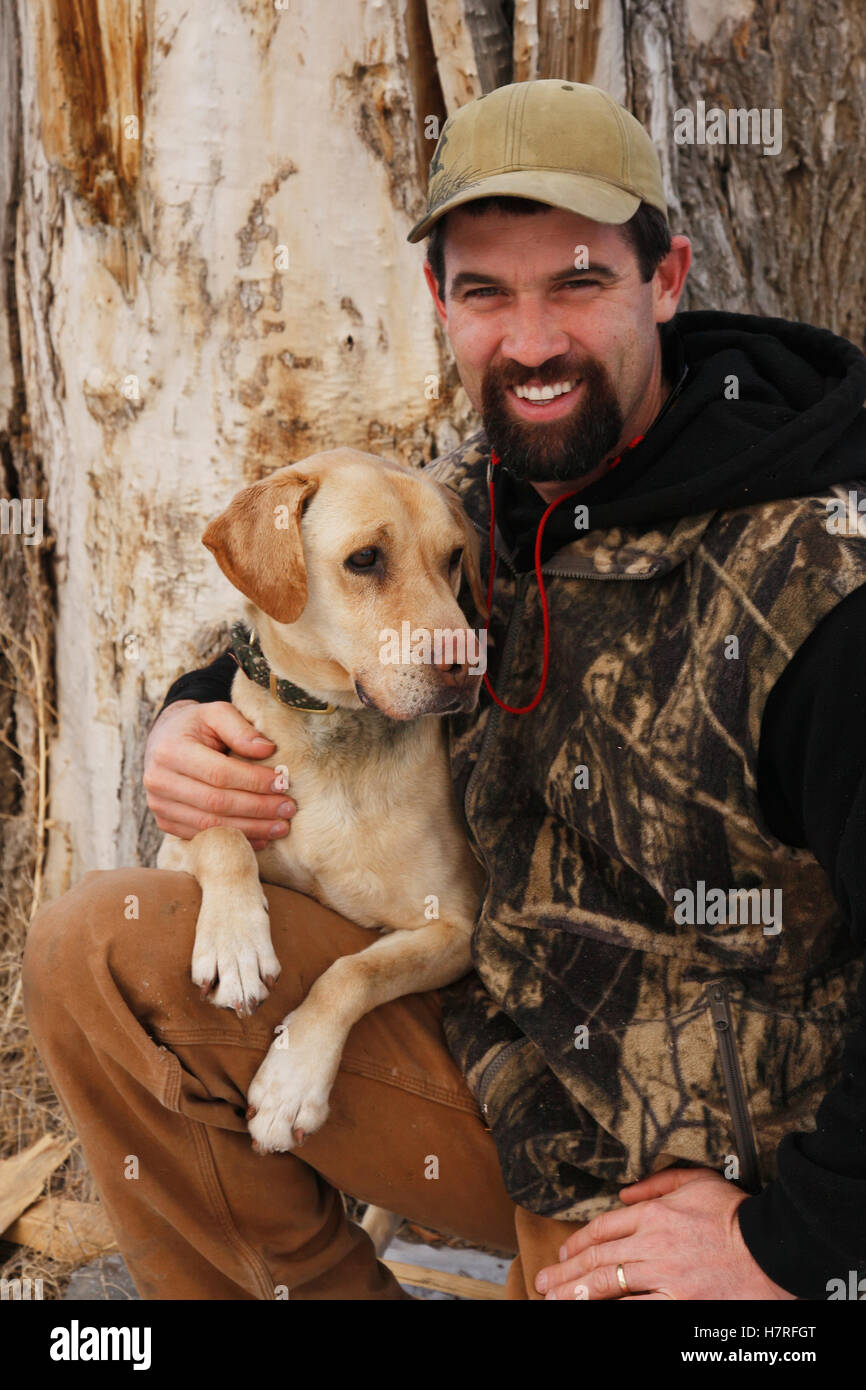 Houndsman Cougar Hunter With Dog Stock Photo - Alamy