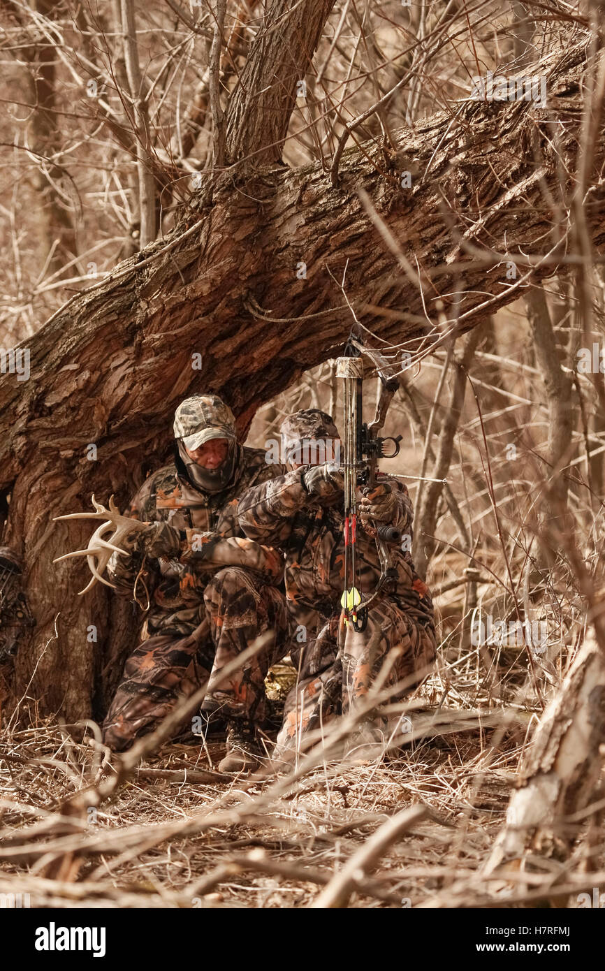 Big Game Hunters in Hunting Concealment Stock Photo - Alamy