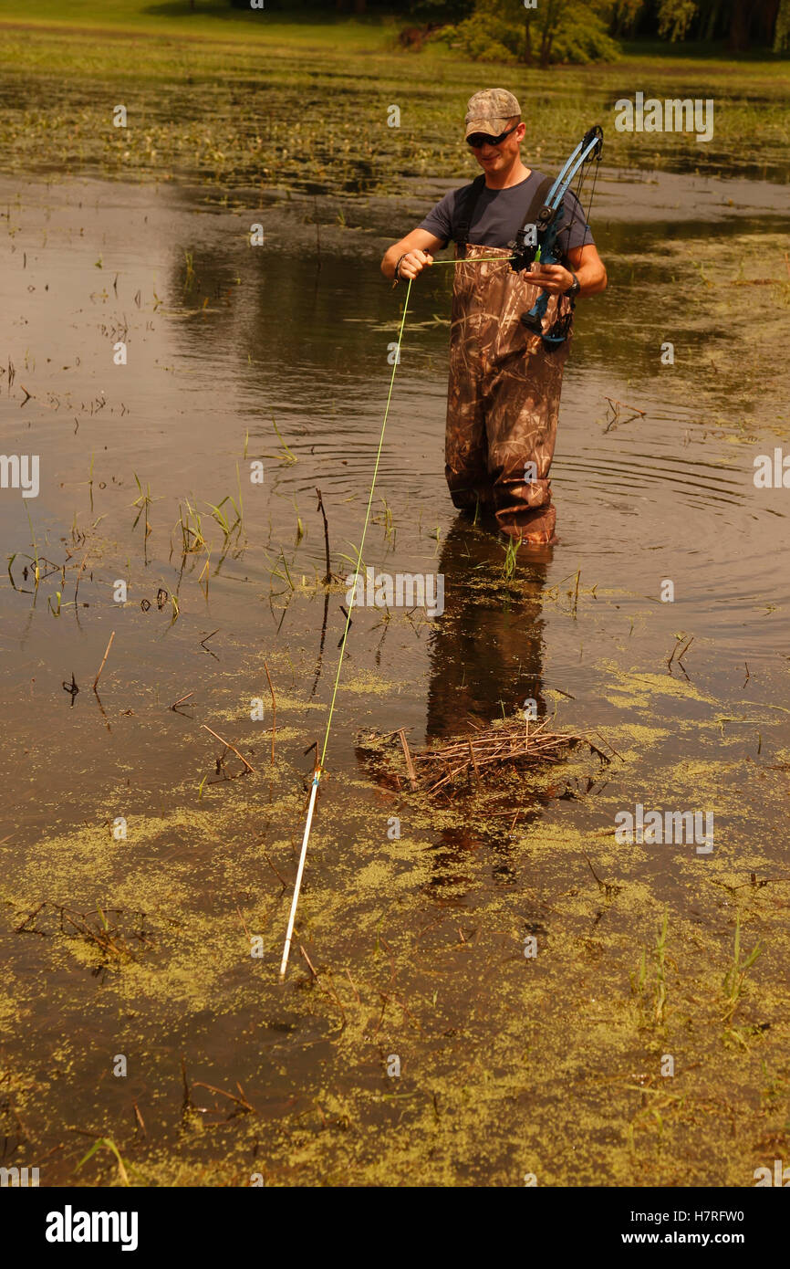 Fishing with bow and arrow hi-res stock photography and images - Alamy