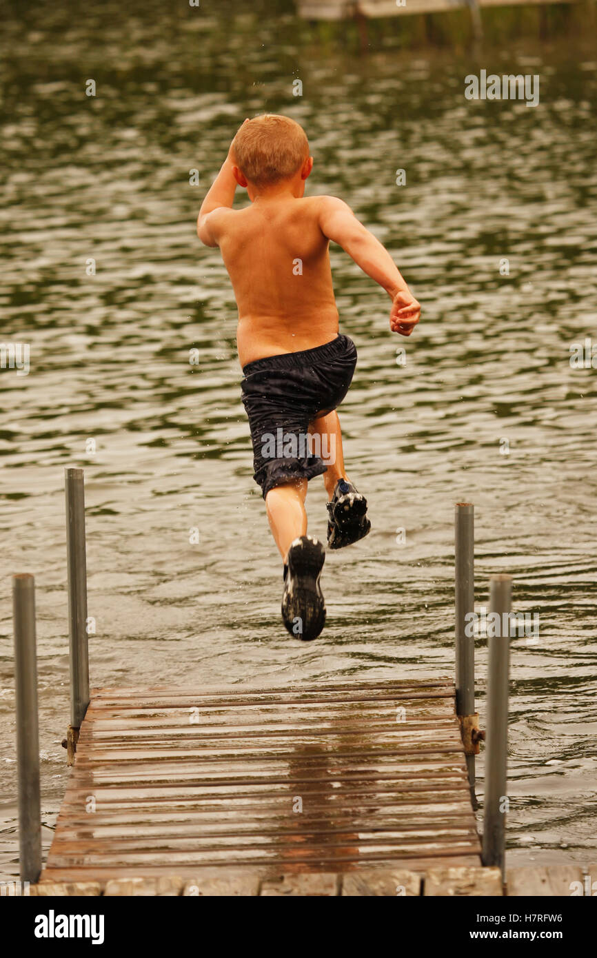 Child Diving Off Pier Stock Photos & Child Diving Off Pier Stock Images ...