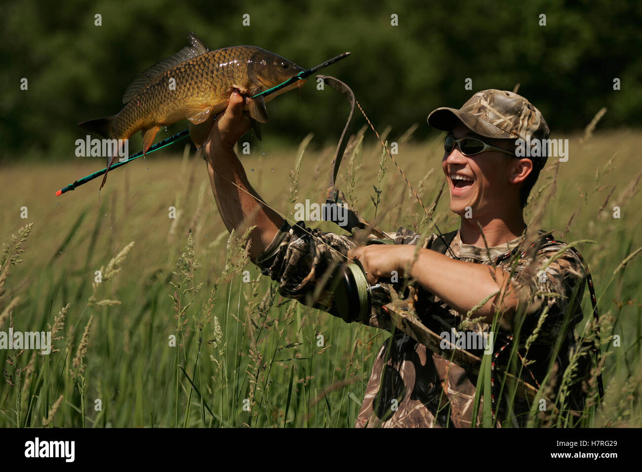 Fishing with bow and arrow hi-res stock photography and images - Alamy