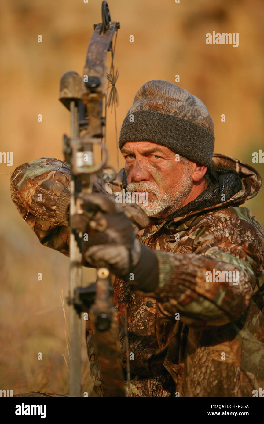 Big Game Bow Hunter Drawing Bow Stock Photo - Alamy