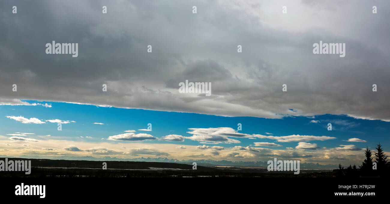 Dramatic panorama chinook arc cloud with blue sky and silhouette ...