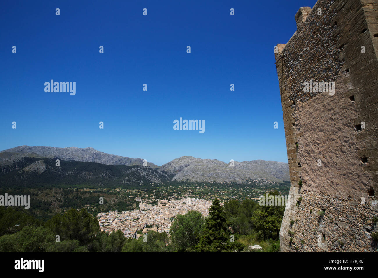 Aerial view of Pollenca and mountains beyond from hill top monastery ...