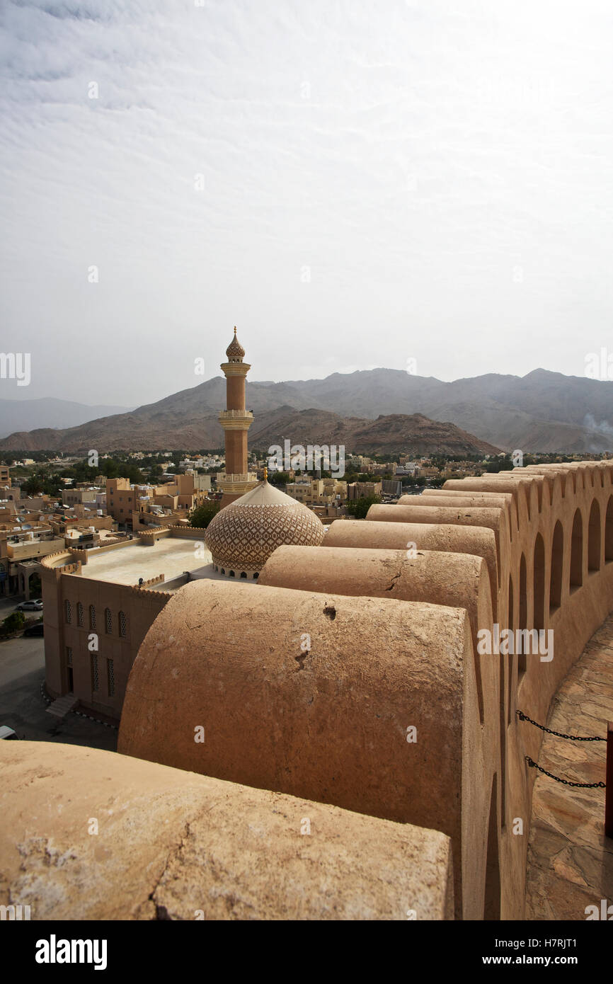 View of Nizwa and Jabal Akhdar mountains from fort walls Stock Photo ...