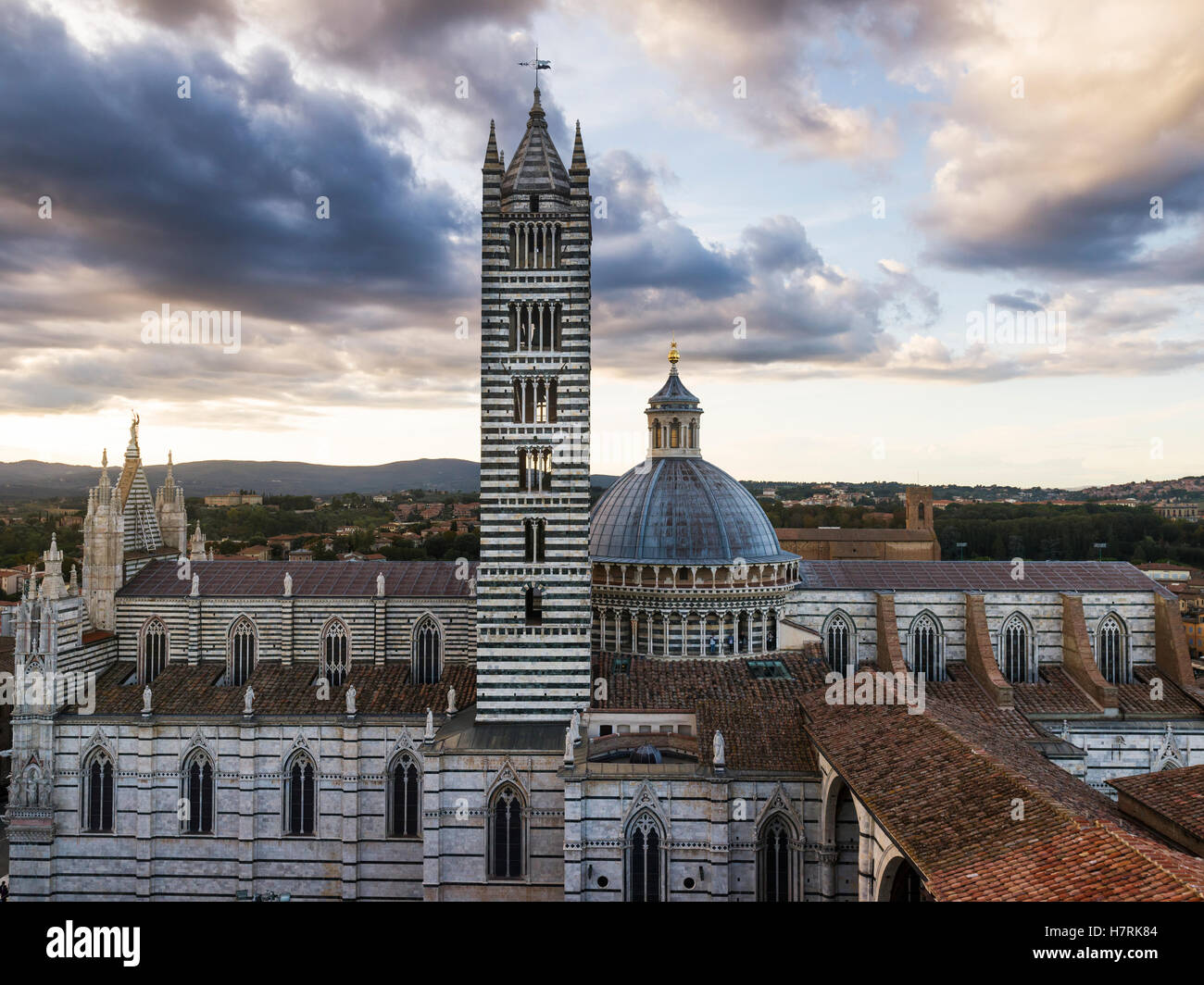 Dome roof and striped tower of Siena Cathedral; Siena, Italy Stock ...