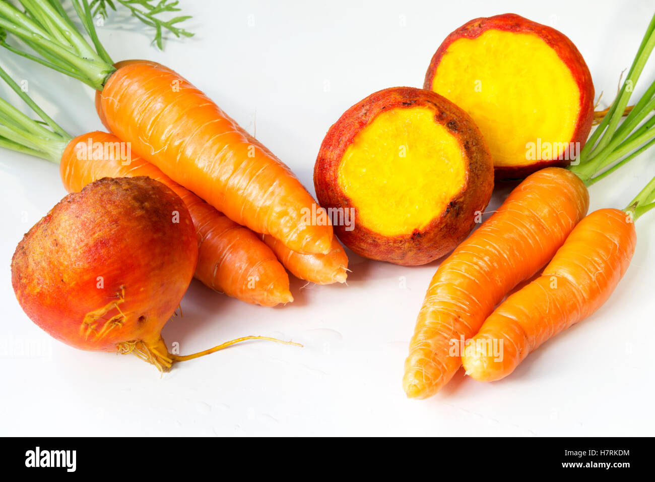 Variety of fresh root vegetables on a white background; Chilliwack ...