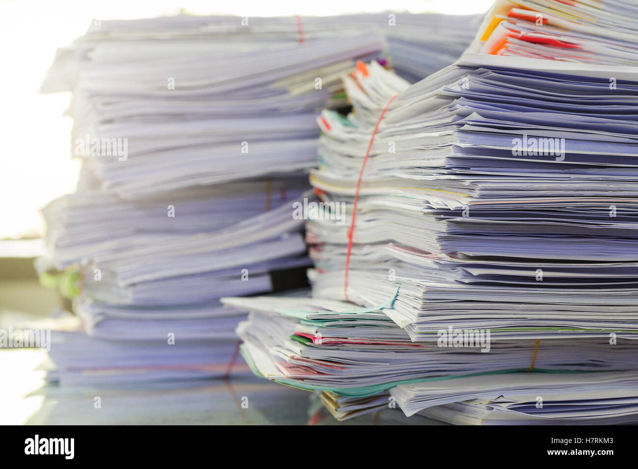 Business Concept, Pile of unfinished business documents on office desk ...
