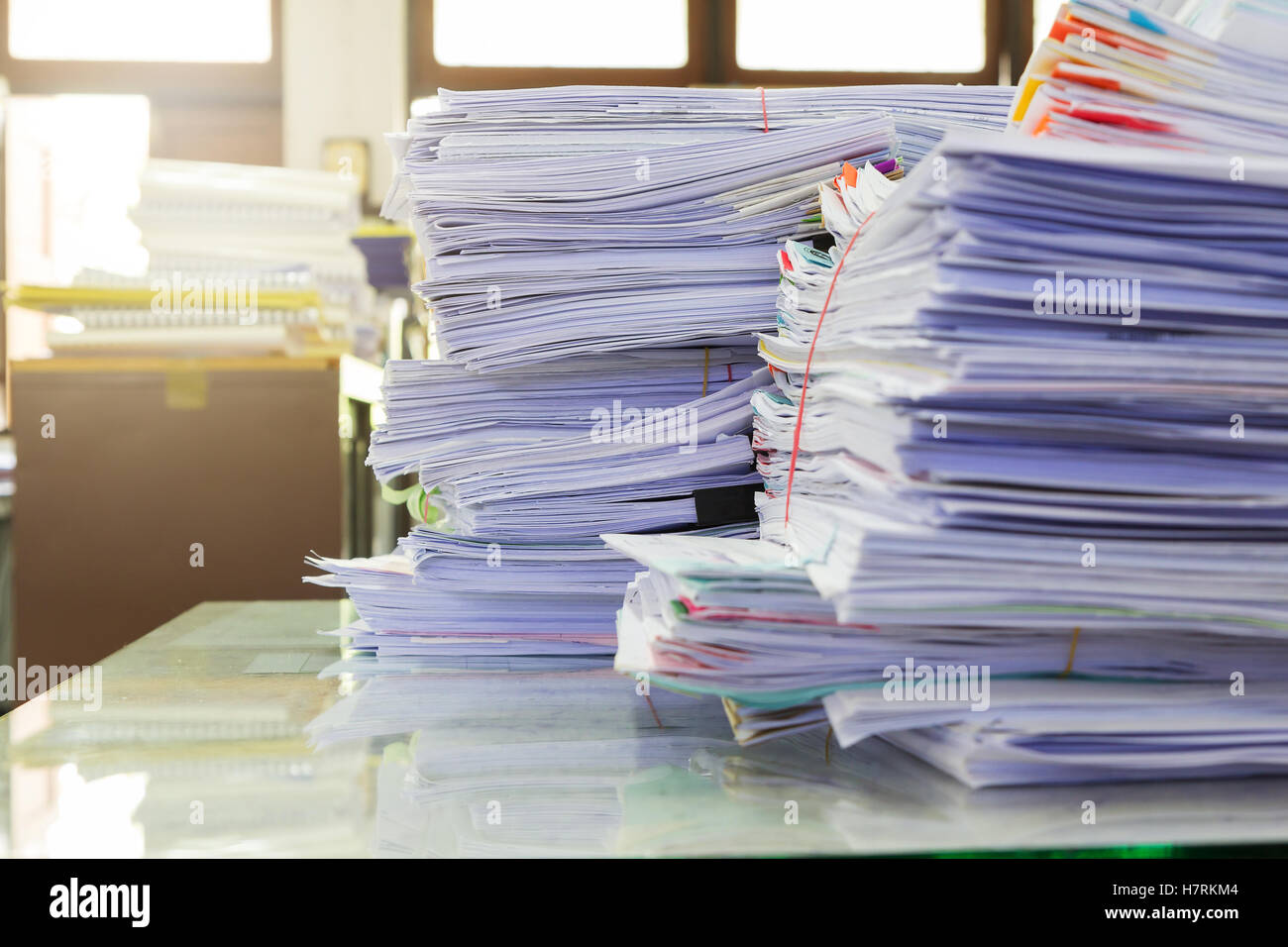 Business Concept, Pile of unfinished business documents on office desk ...
