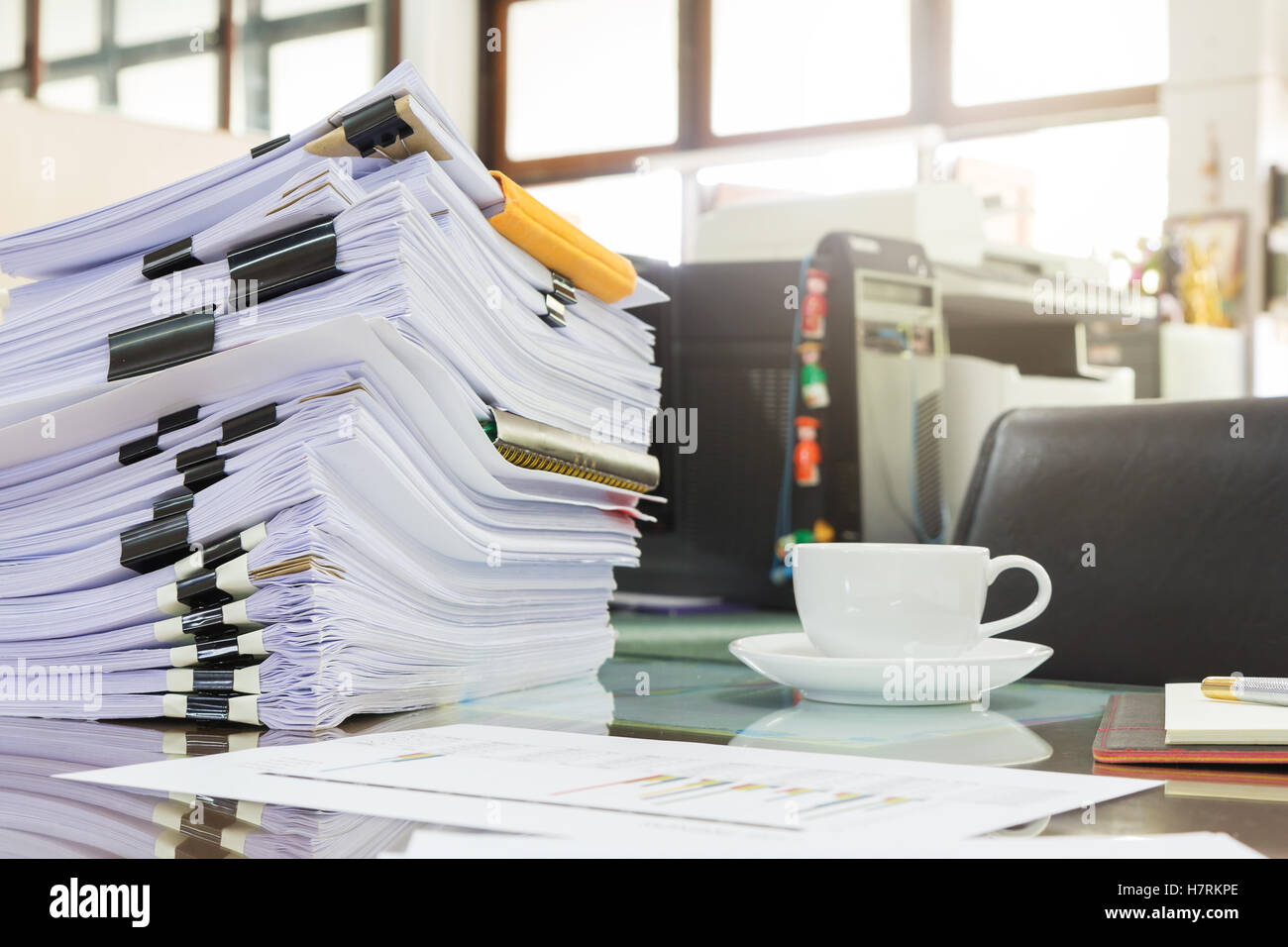 Business Concept, Pile of unfinished business documents on office desk ...