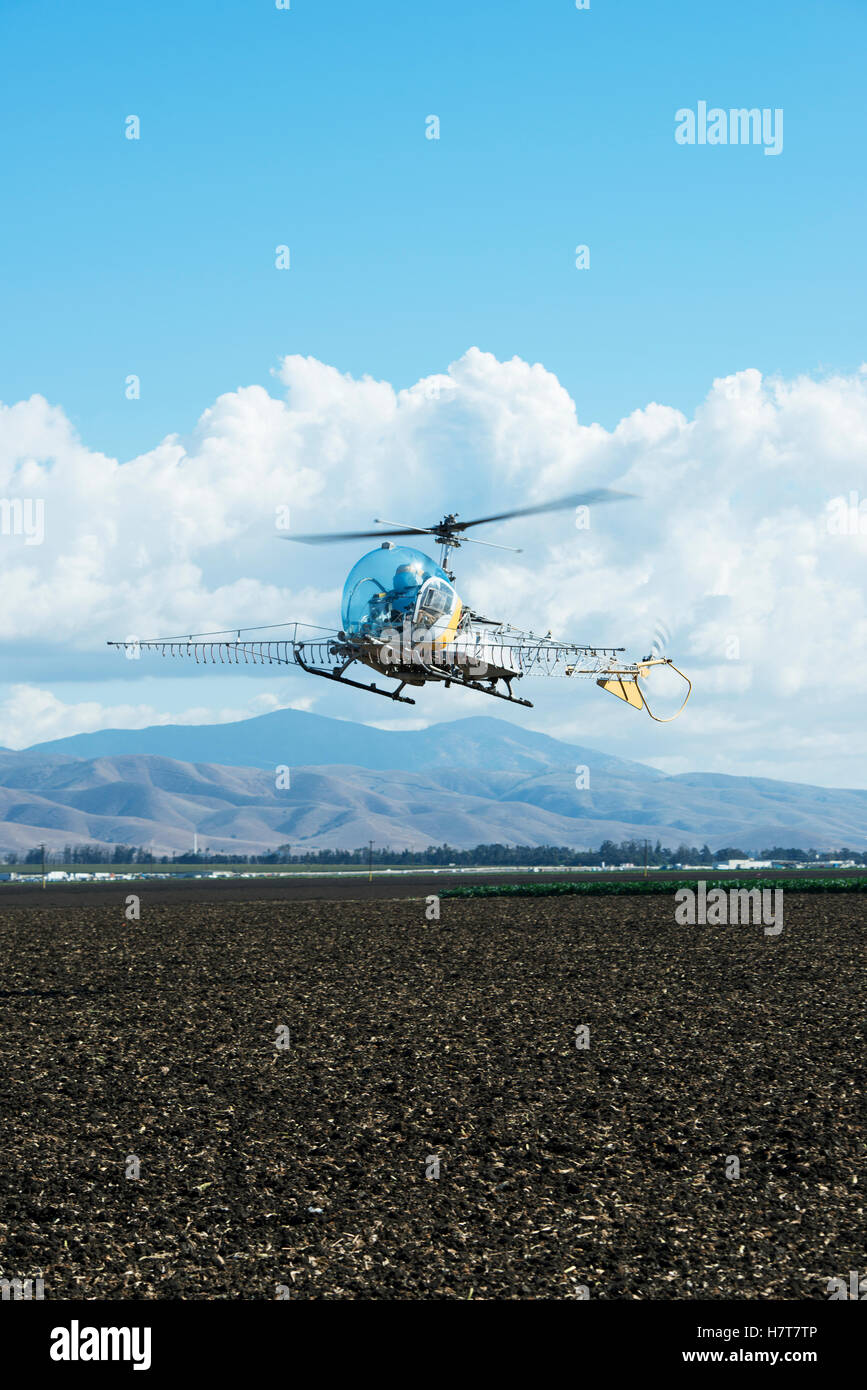 Helicopter spraying pesticide hi-res stock photography and images - Alamy