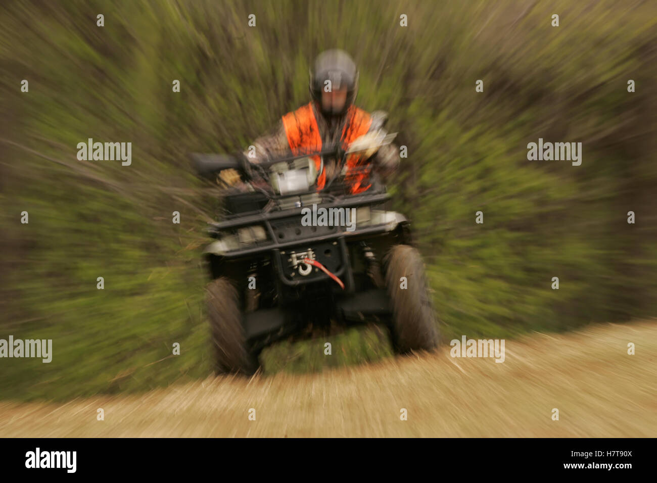 Man Riding Atv Stock Photo - Alamy