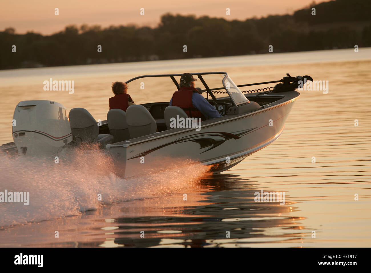 Running Boat On Lake Stock Photo - Alamy
