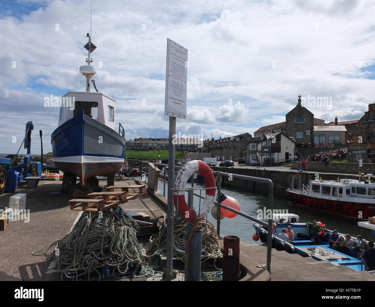 boats in the harbour at Seahouses, Northumberland UK Stock Photo - Alamy
