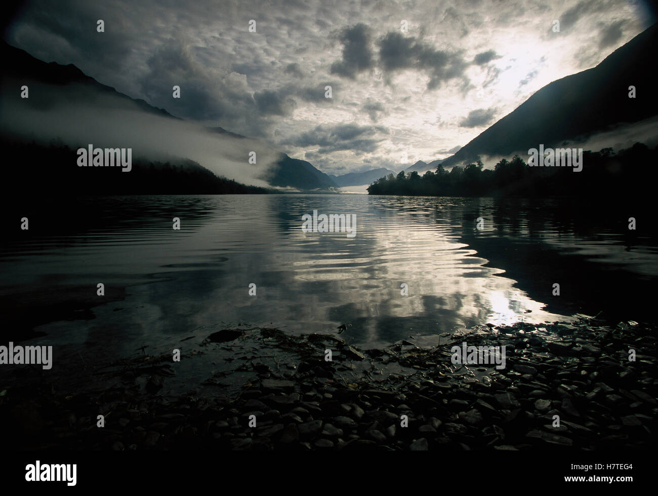 Lake Alabaster at dawn, along the Hollyford and Pike Tracks, Fjordland ...