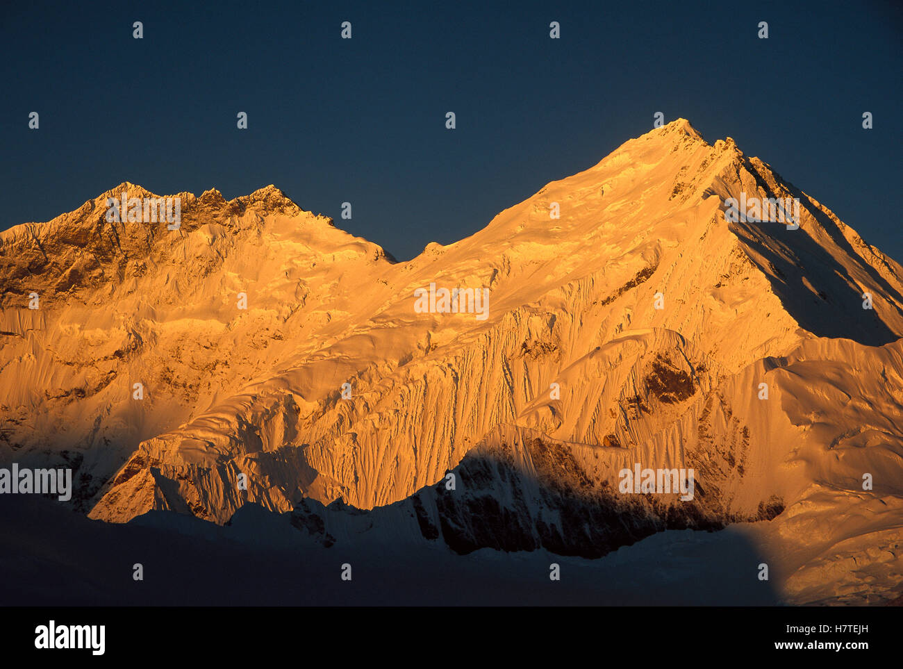 Dawn light on Mt Lhotse (Left) the South Col of Mt Everest (Center) and ...