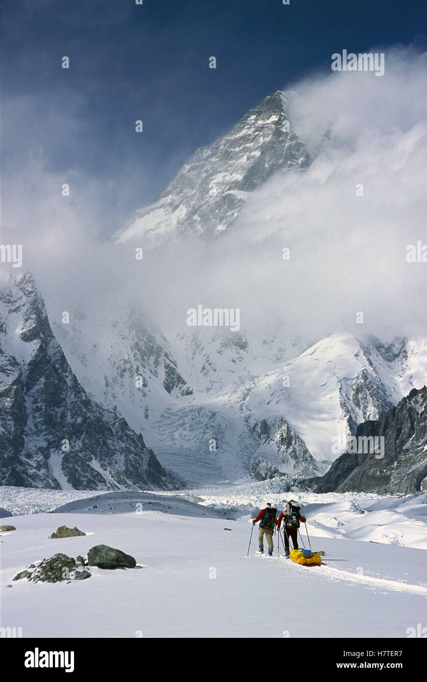 Skiers approaching the base of K2, second highest peak in the world ...