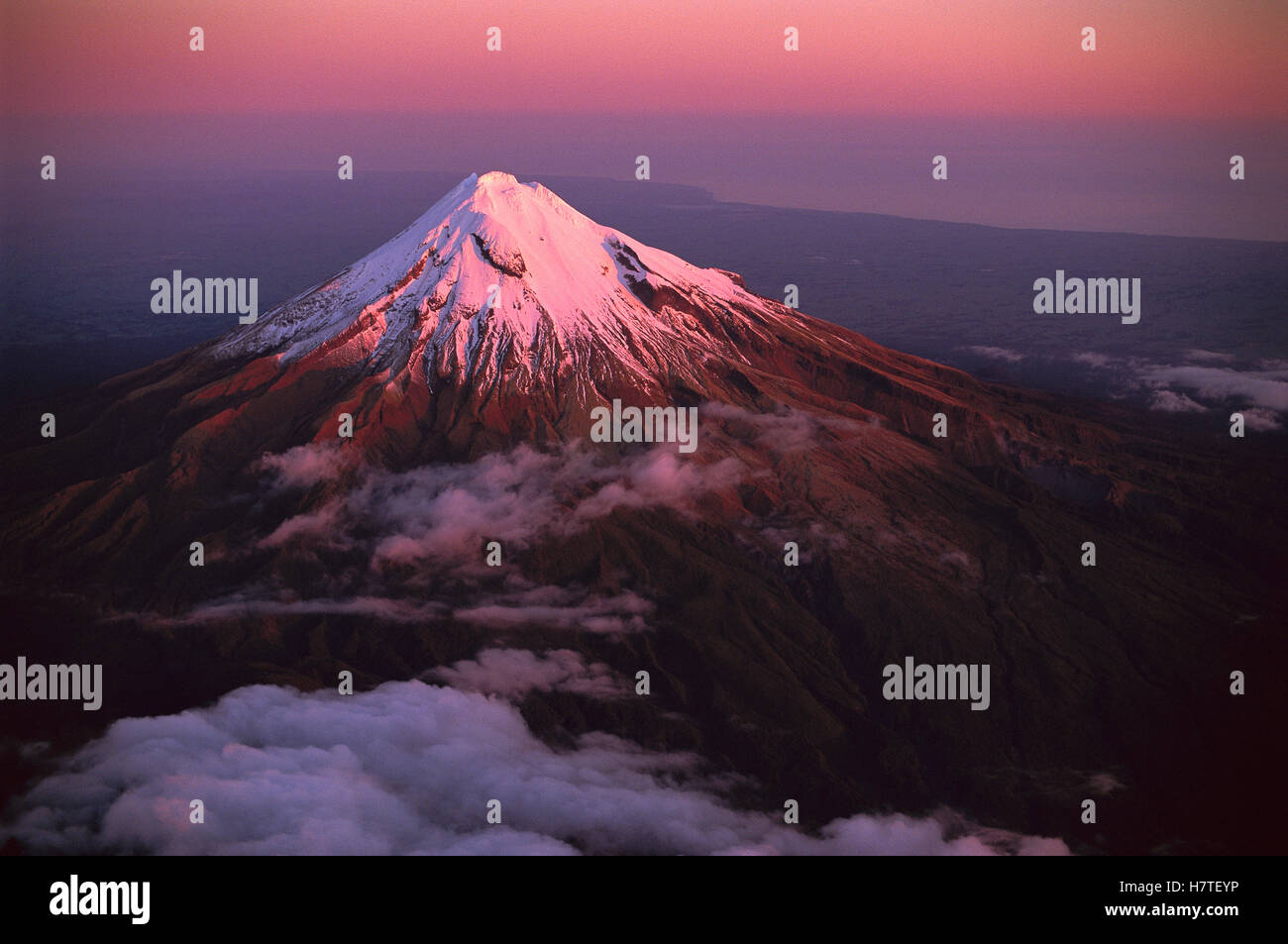 Evening light on Mt Taranaki, also known as Mt Egmont (8,261 feet) a ...