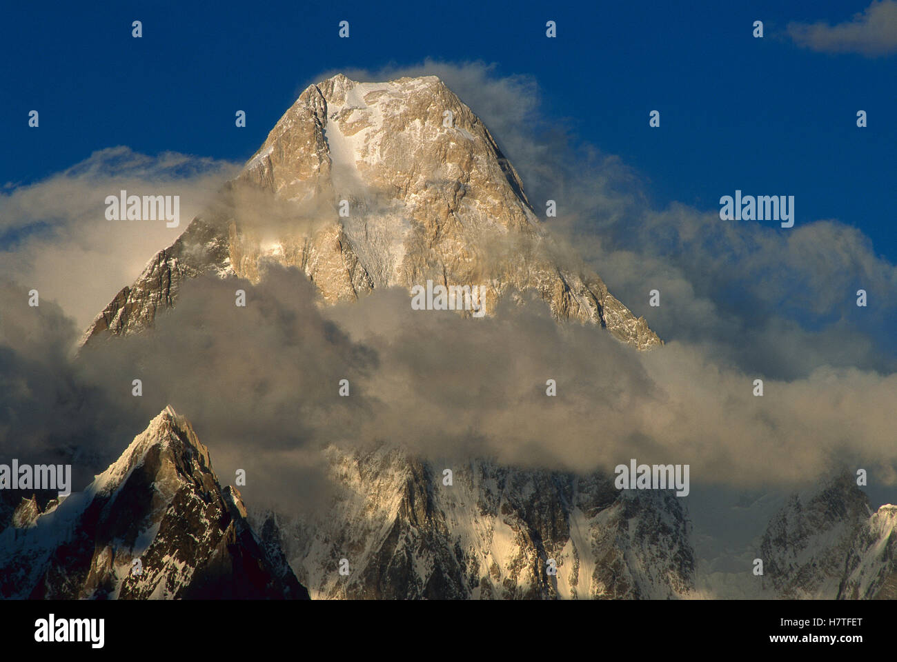 Gasherbrum IV (7,925 meters) showing west face amid clouds, Karakoram ...