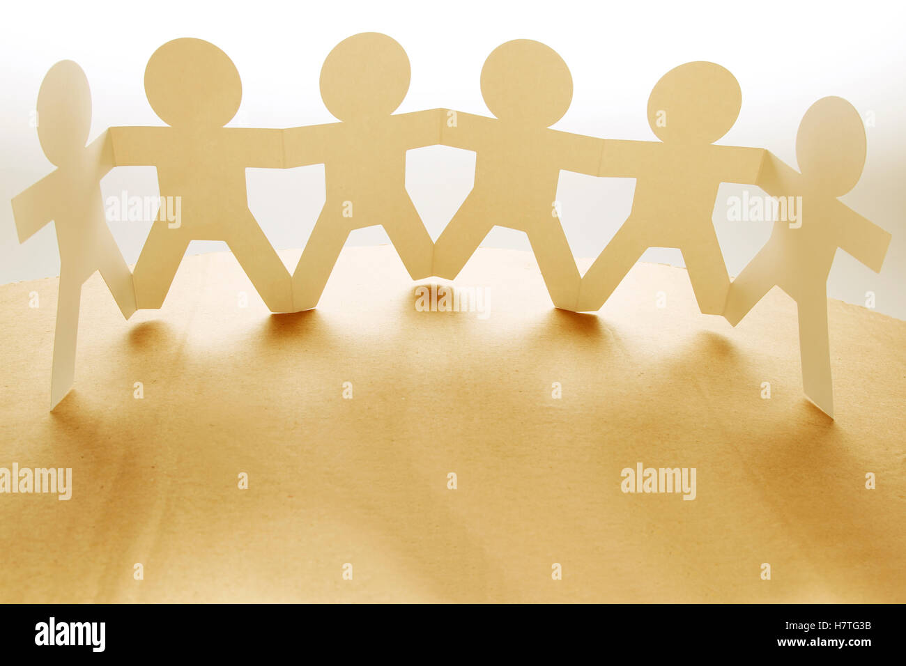 Team of paper doll people Stock Photo - Alamy