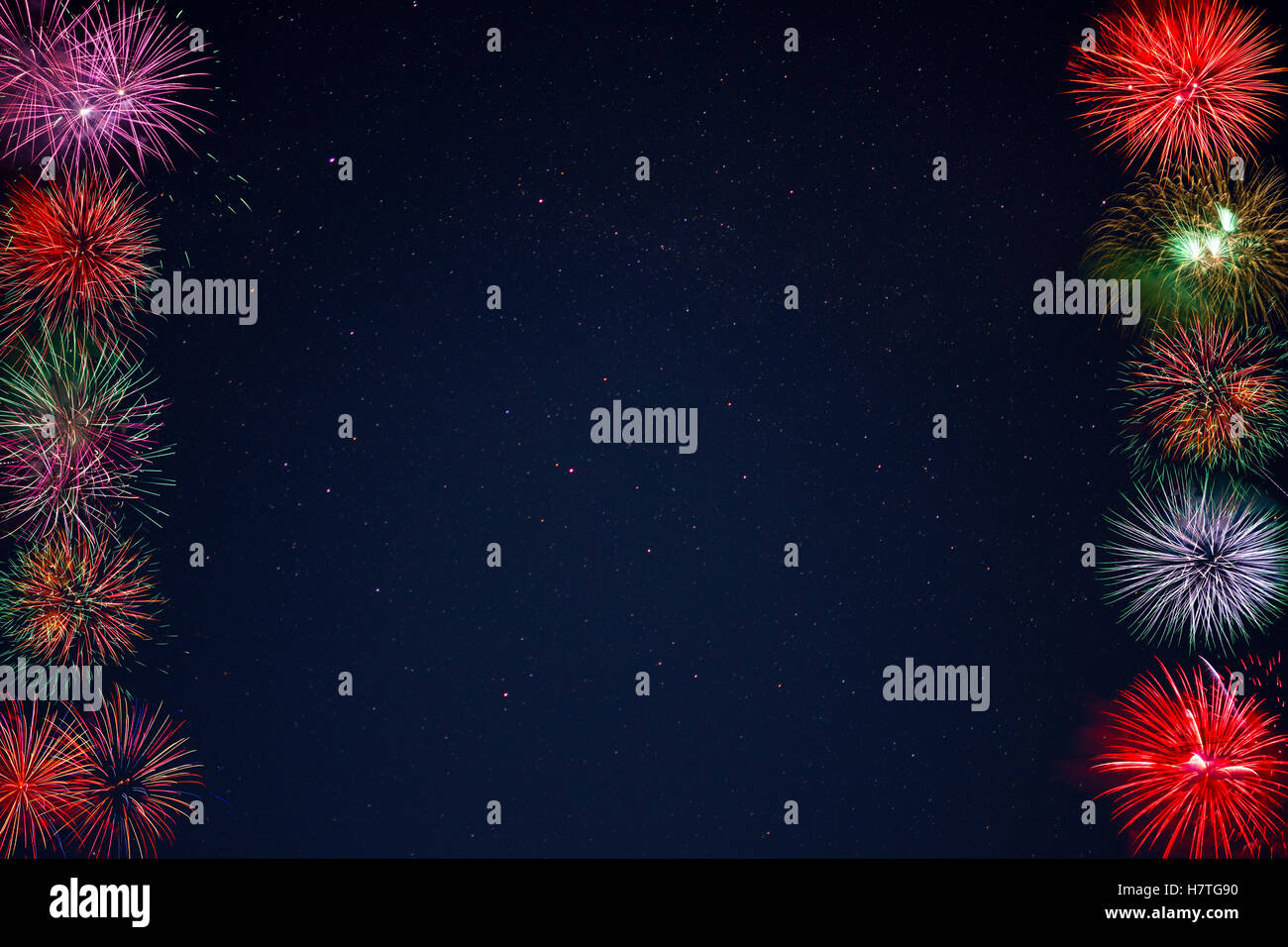 Frame of beautiful celebration fireworks over night sky, copy space ...