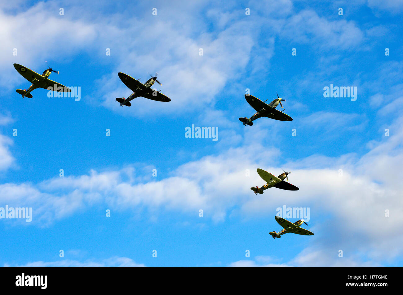 5 Spitfire Aircraft in Formation, Duxford Air show Stock Photo - Alamy