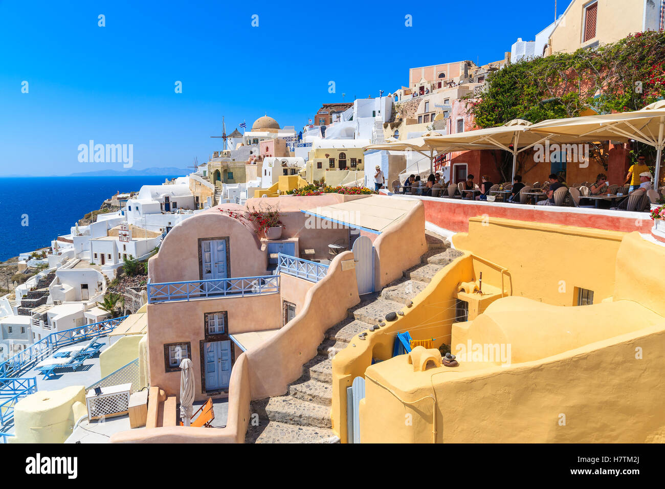 OIA TOWN, SANTORINI ISLAND - MAY 23, 2016: colorful houses and ...