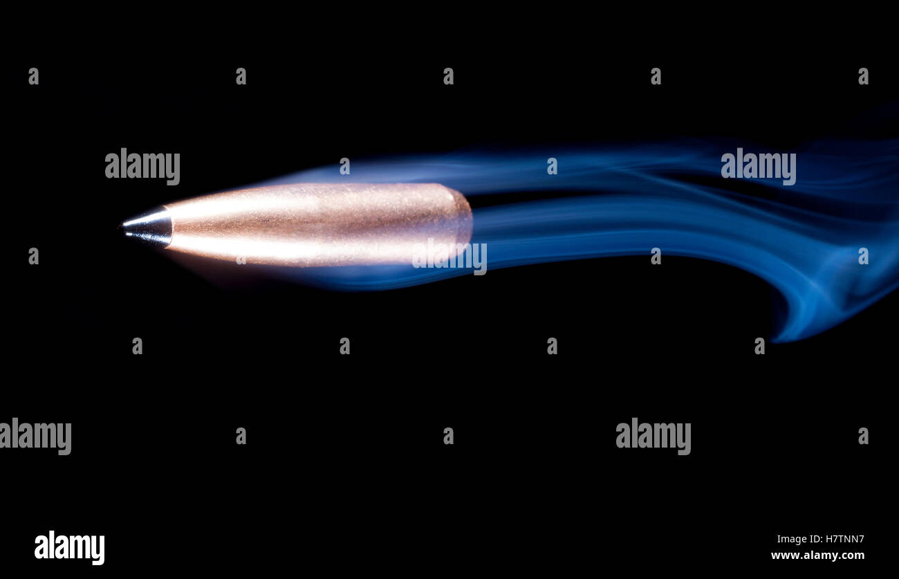 Single polymer tipped and copper plated bullet with blue smoke Stock ...