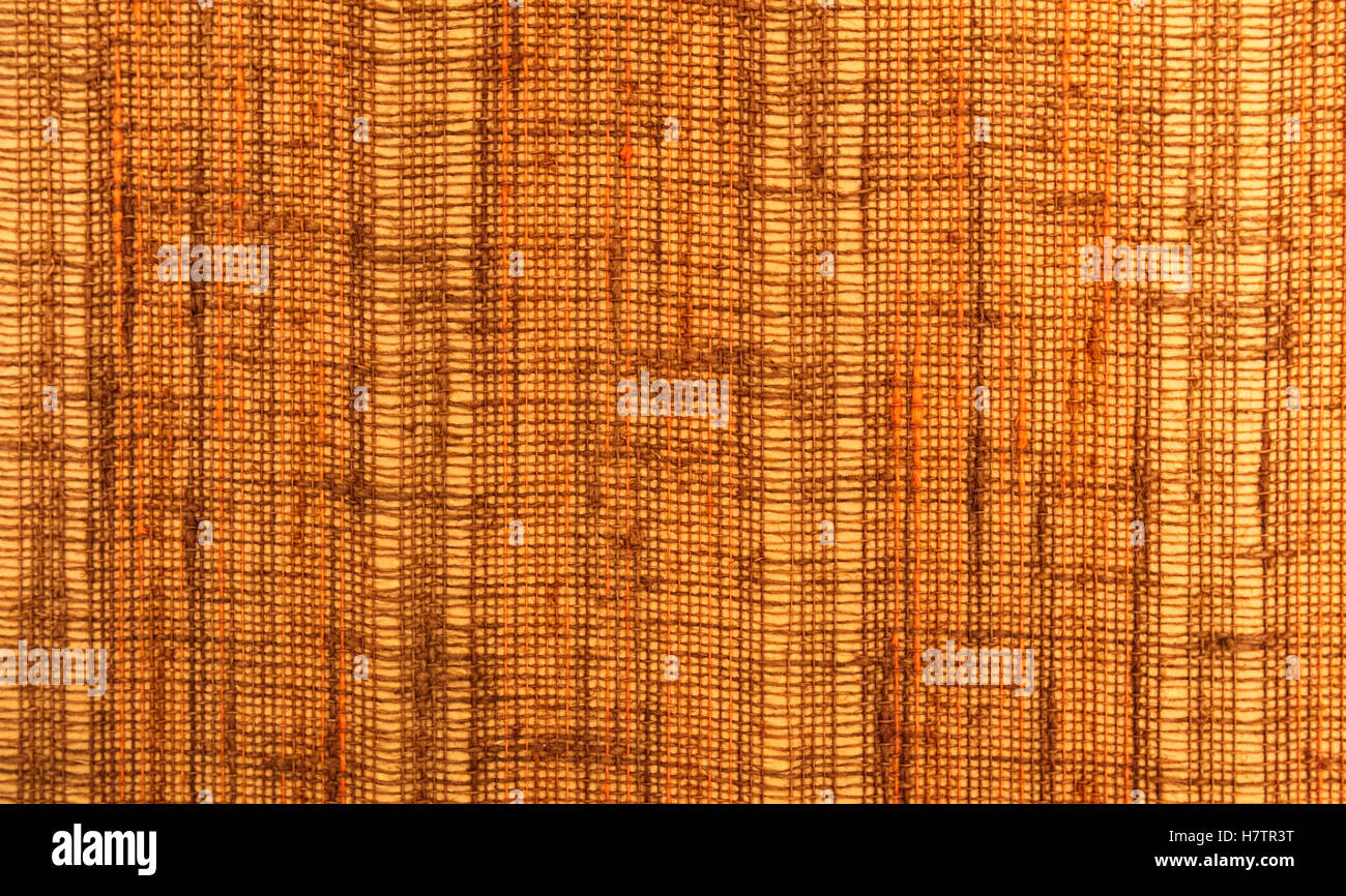 Close-up of a textile surface with orange and brown color Stock Photo ...