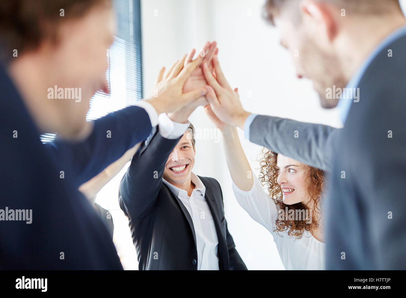 Group high five hi-res stock photography and images - Alamy