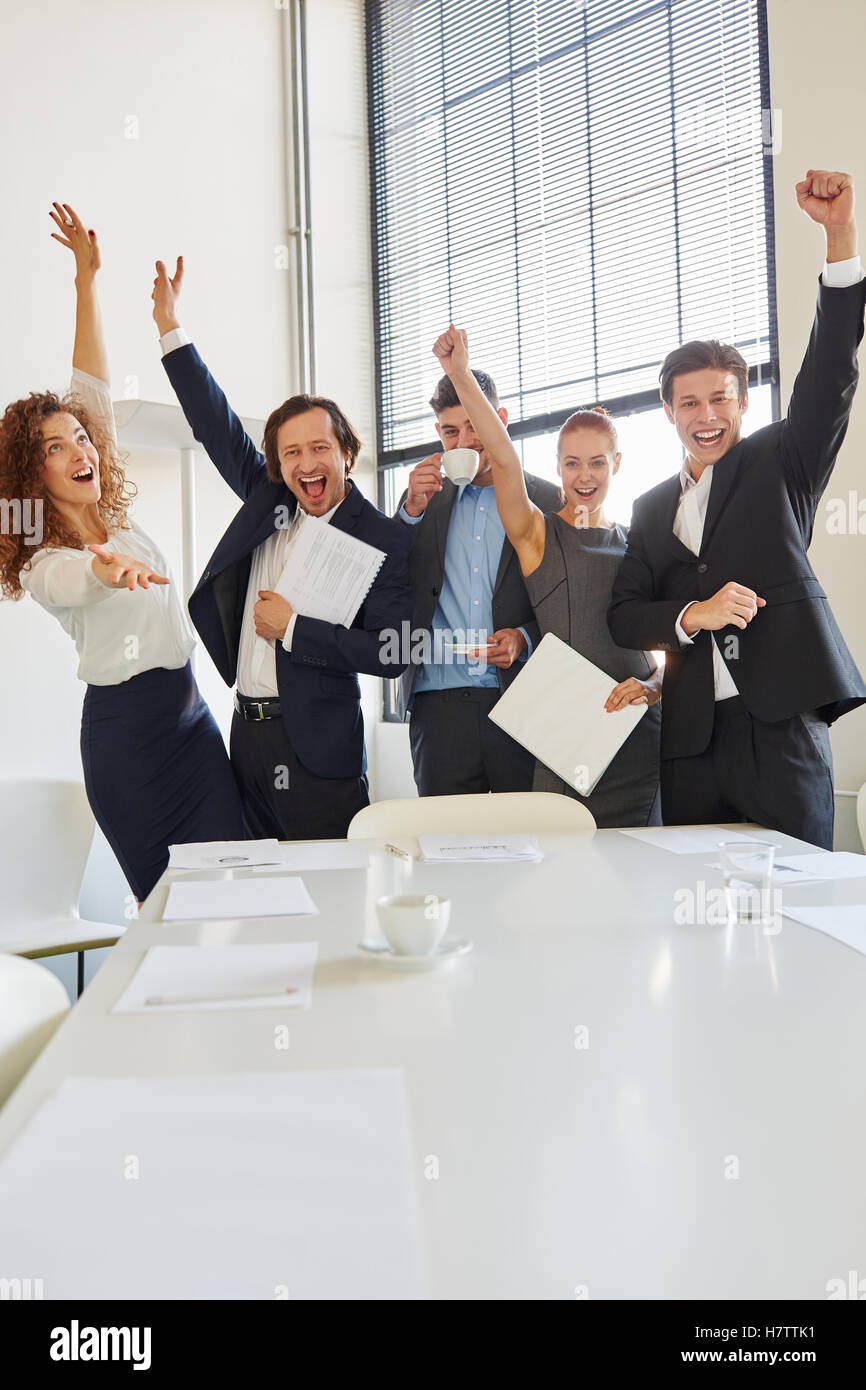 Business people celebrating their success like winners Stock Photo - Alamy