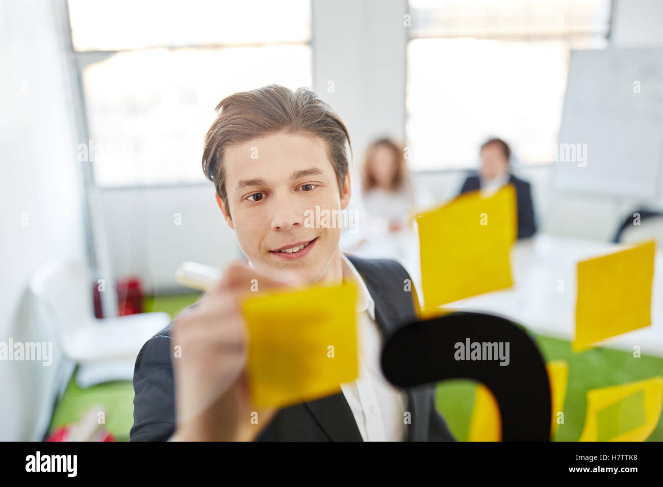 Creative student brainstorming with sticky notes Stock Photo - Alamy