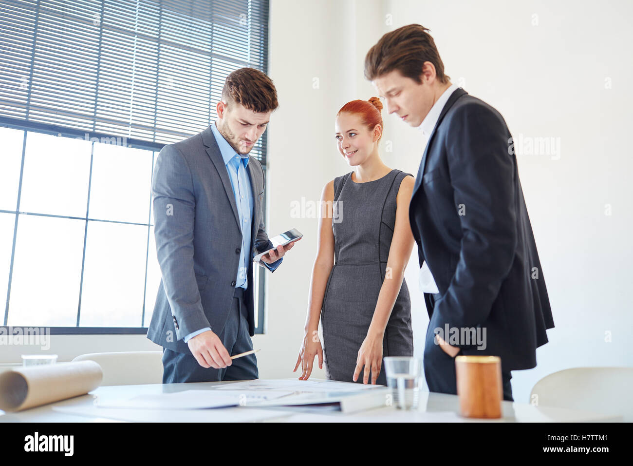 Business people planning in team at start-up Stock Photo - Alamy