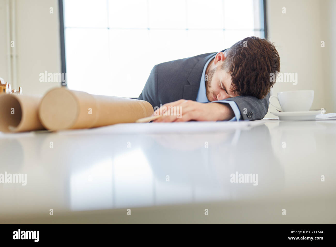 Stressed and exhausted businessman with burnout Stock Photo - Alamy