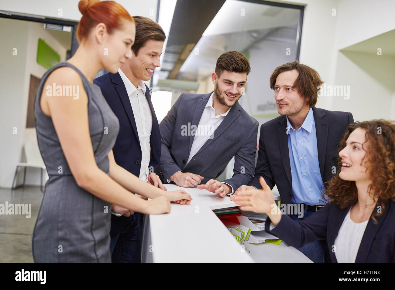 Business people greeting each other in welcome meeting Stock Photo - Alamy