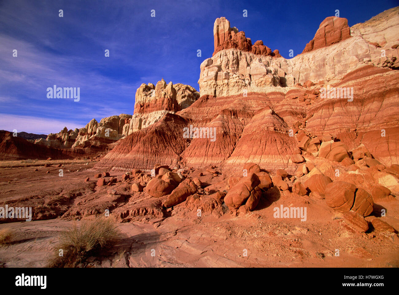 Sandstone buttes, eroded slopes, boulders, spring, Escalante Grand ...