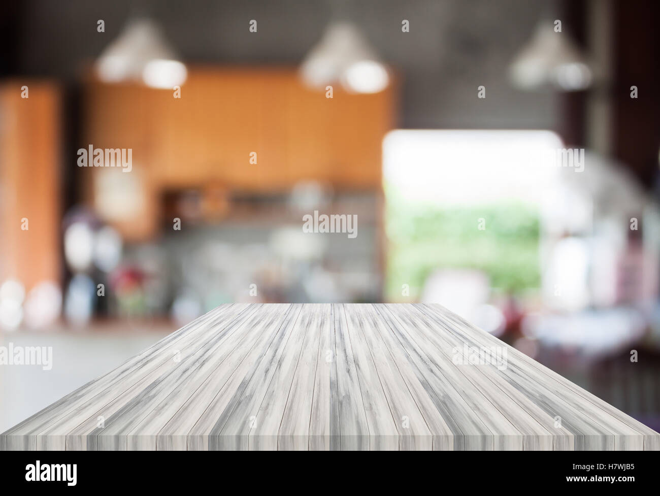 Abstract blur coffee shop with white empty table top. For product ...