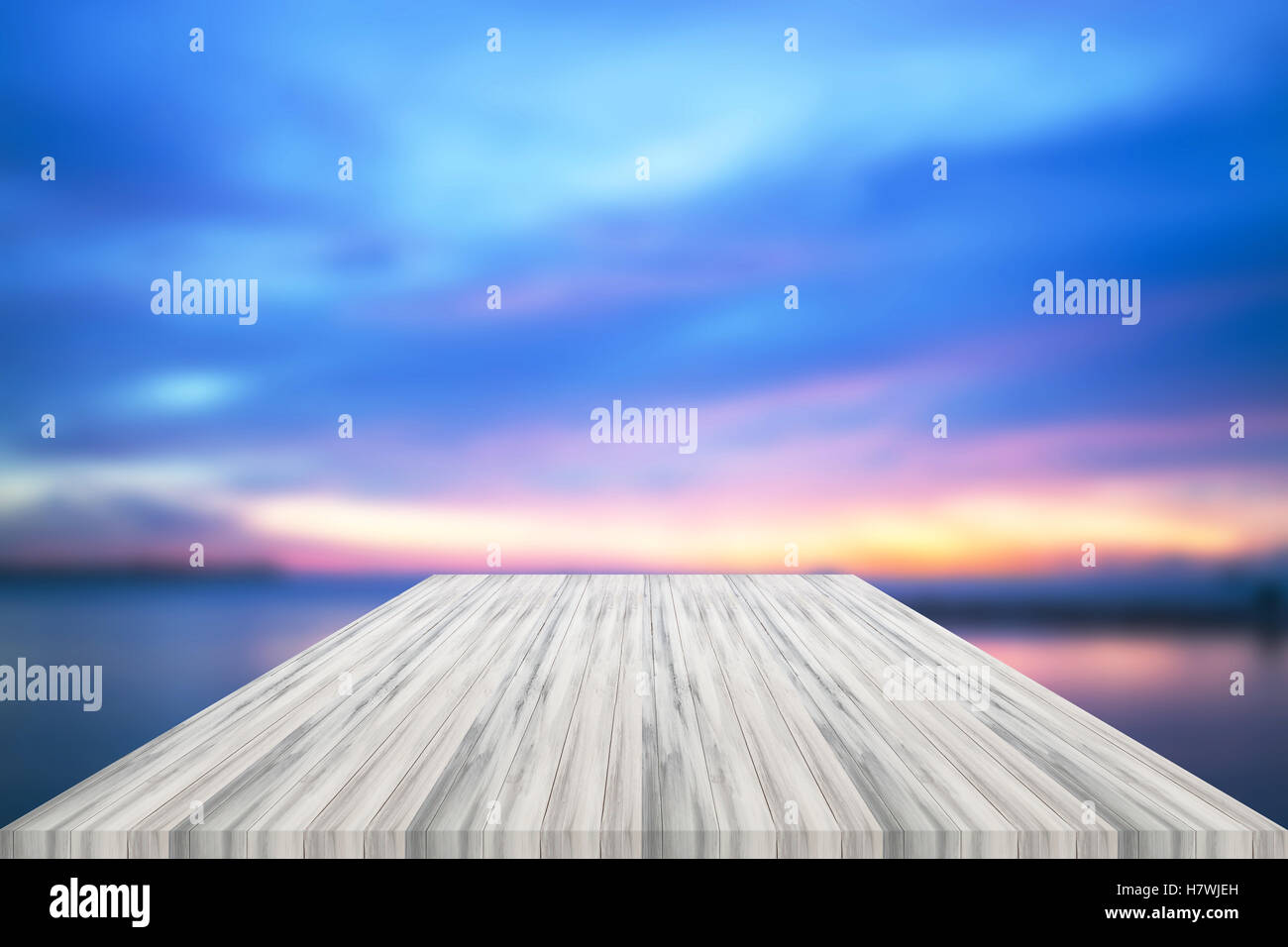 Empty white table top with sunset background. For product display Stock ...